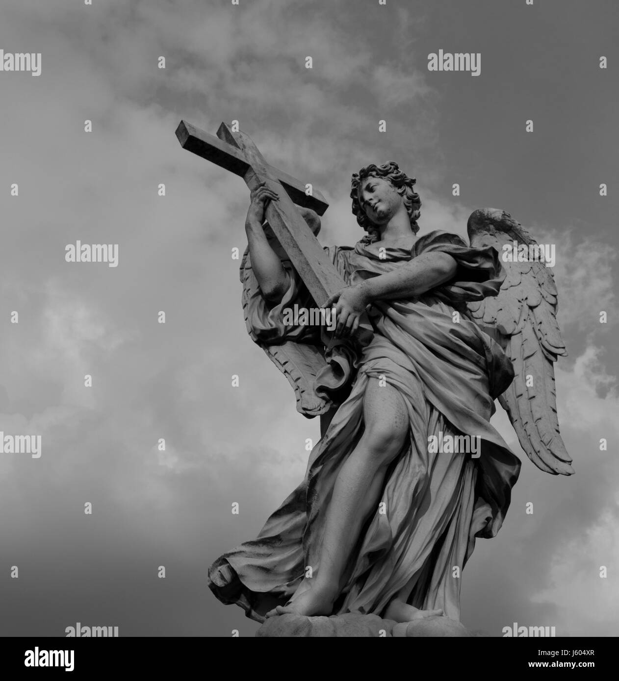 Angel with the cross Stock Photo - Alamy