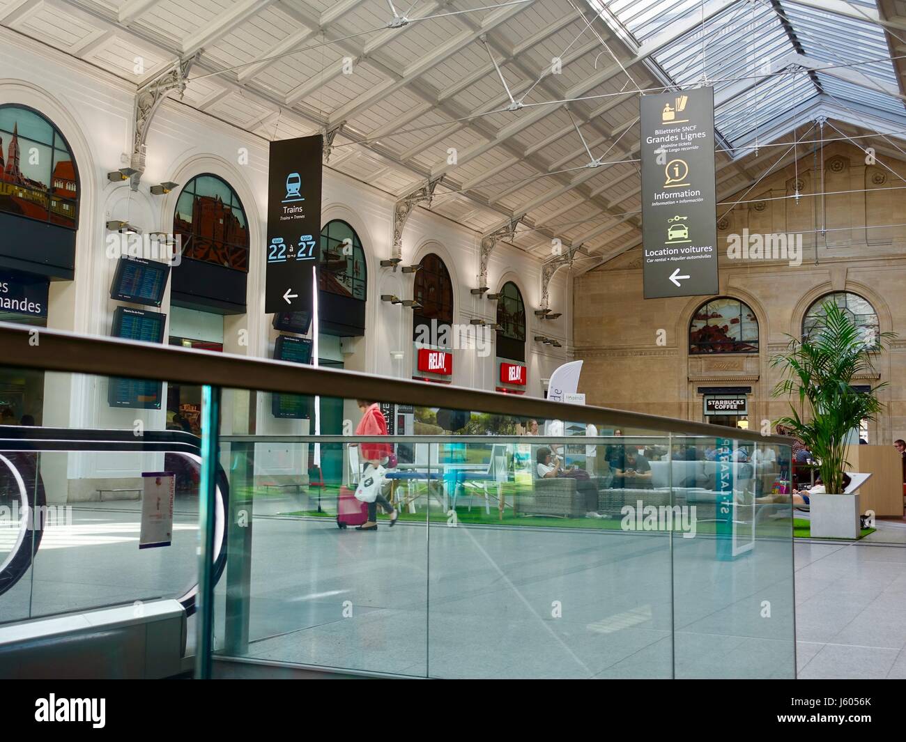 People waiting for trains in the comfortable waiting area of Saint ...