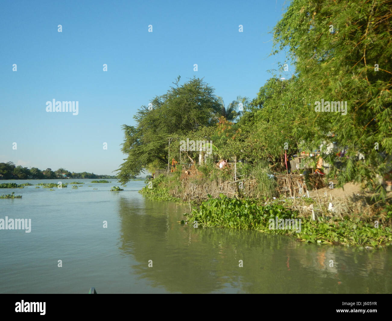 A reference to the geographic location near the riverbanks of Bulusan ...