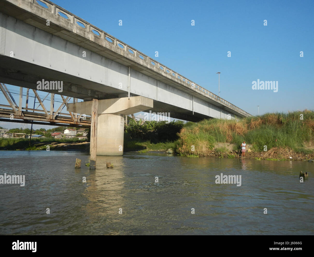 A photograph of the Old and New Sulipan Apalit Bridges over the ...
