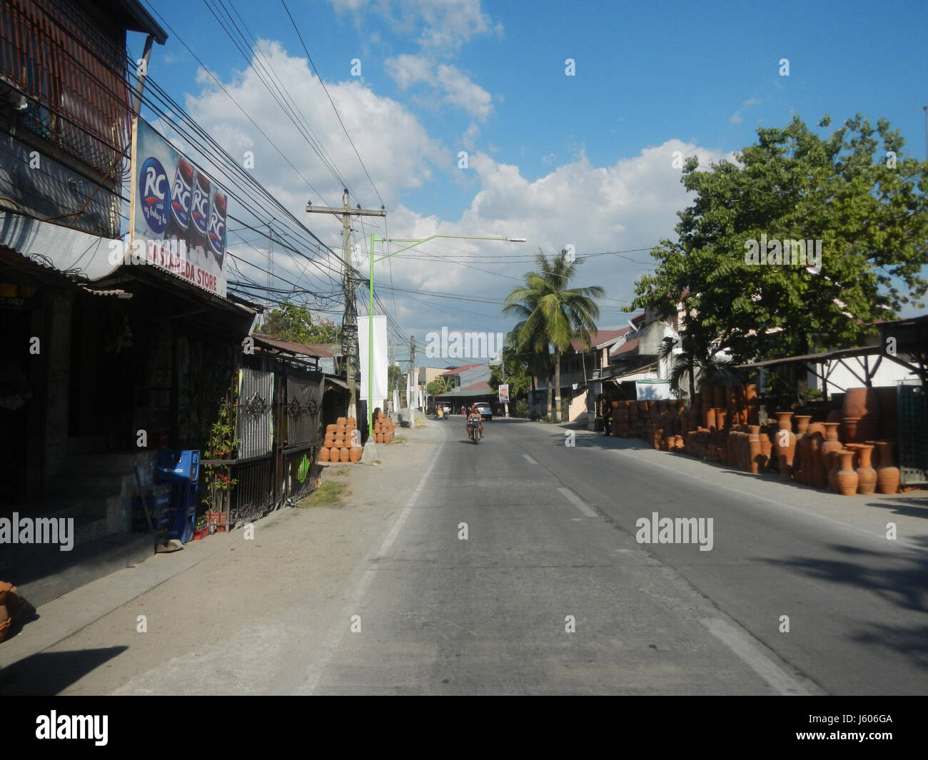 This photograph captures a view of MacArthur Highway, a major road in ...