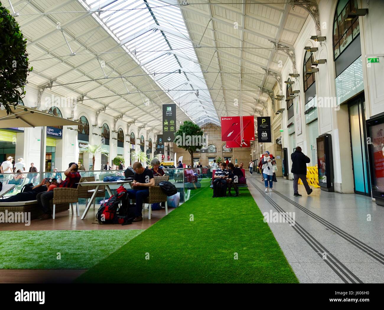 People waiting for trains in the comfortable waiting area of Saint ...