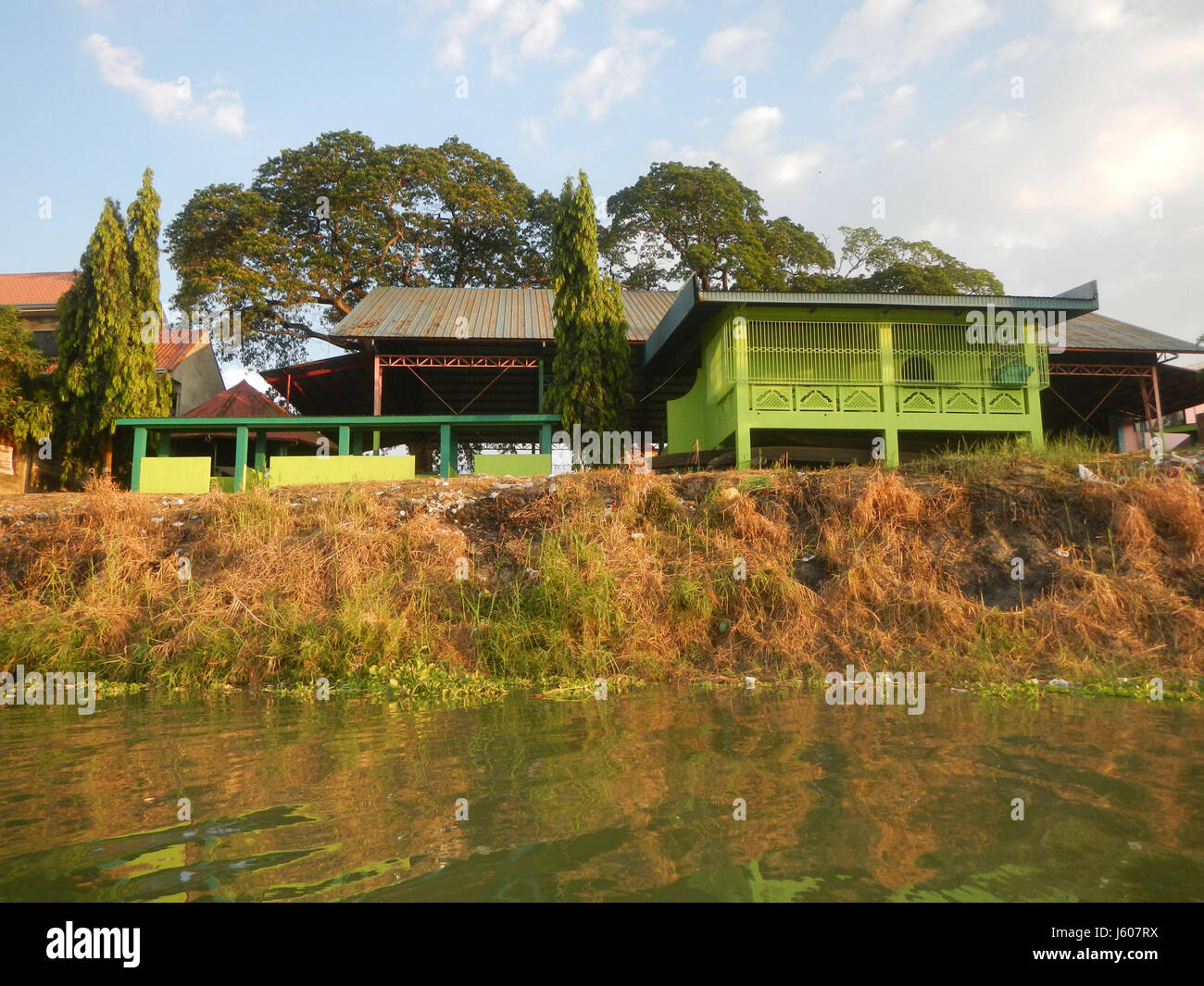 This image captures the picturesque sunsets over the Pampanga River ...