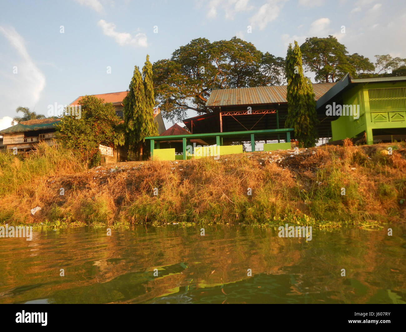 This image captures the sunset over the river districts in San Juan ...
