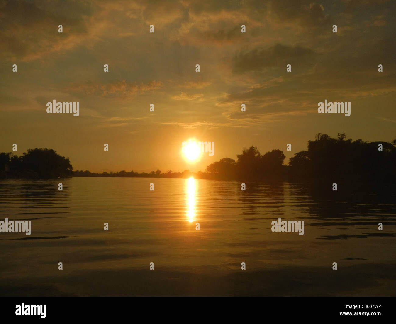 This image showcases the breathtaking sunset view over the Pampanga ...