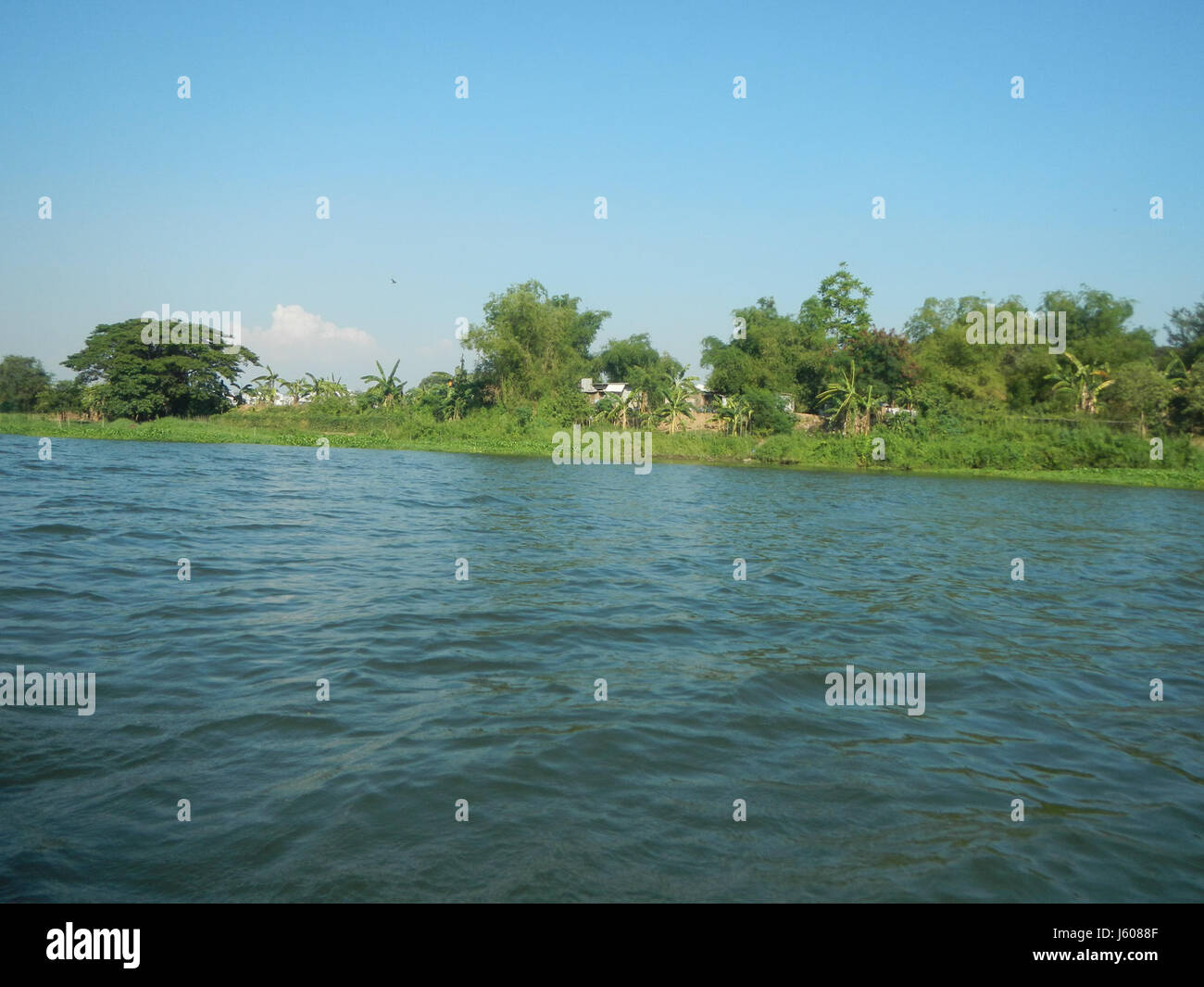 The image shows the rural landscape of Pulilan, Plaridel, in Bulacan ...