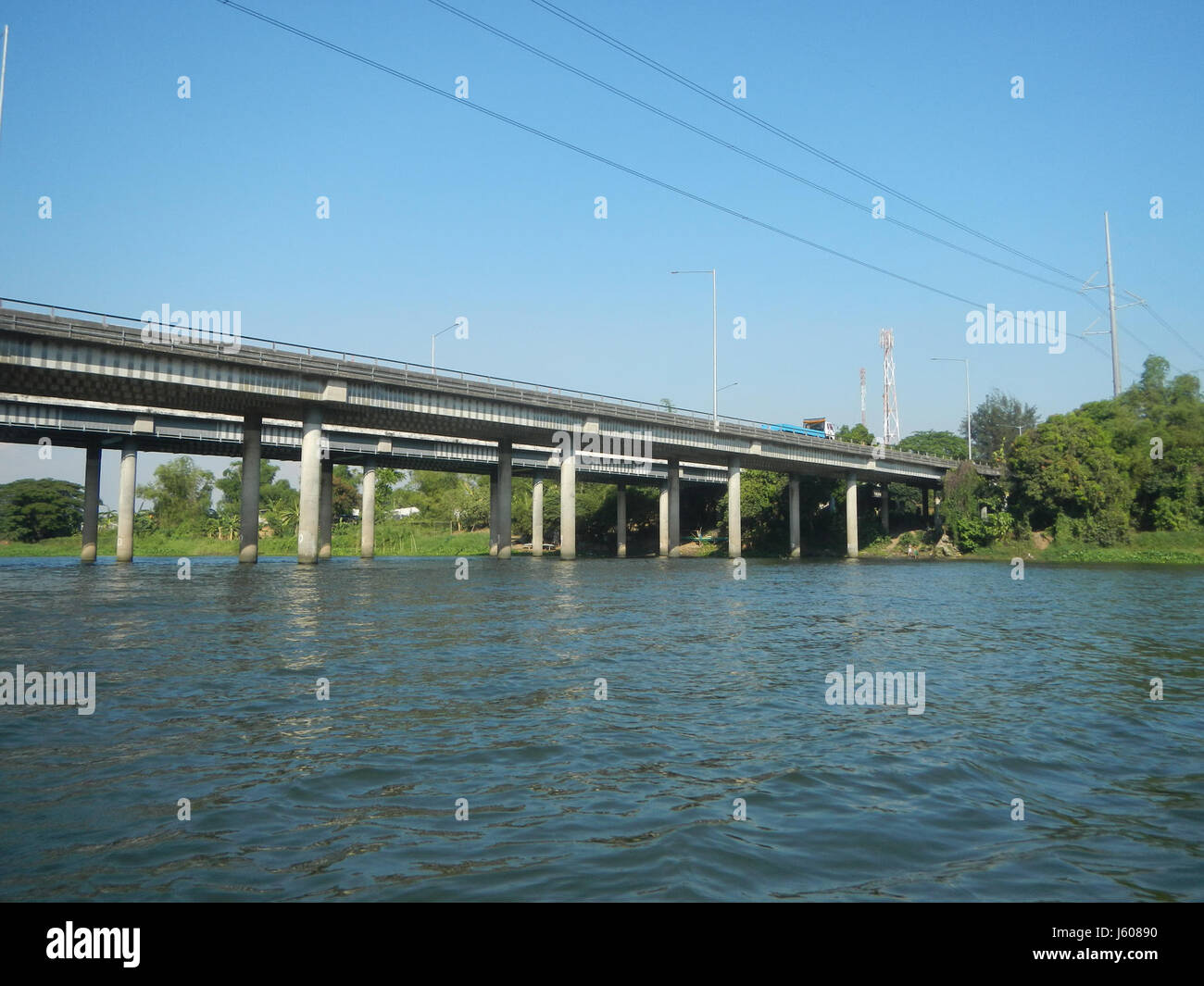 This photograph highlights the riverside of Pulilan and Plaridel in ...