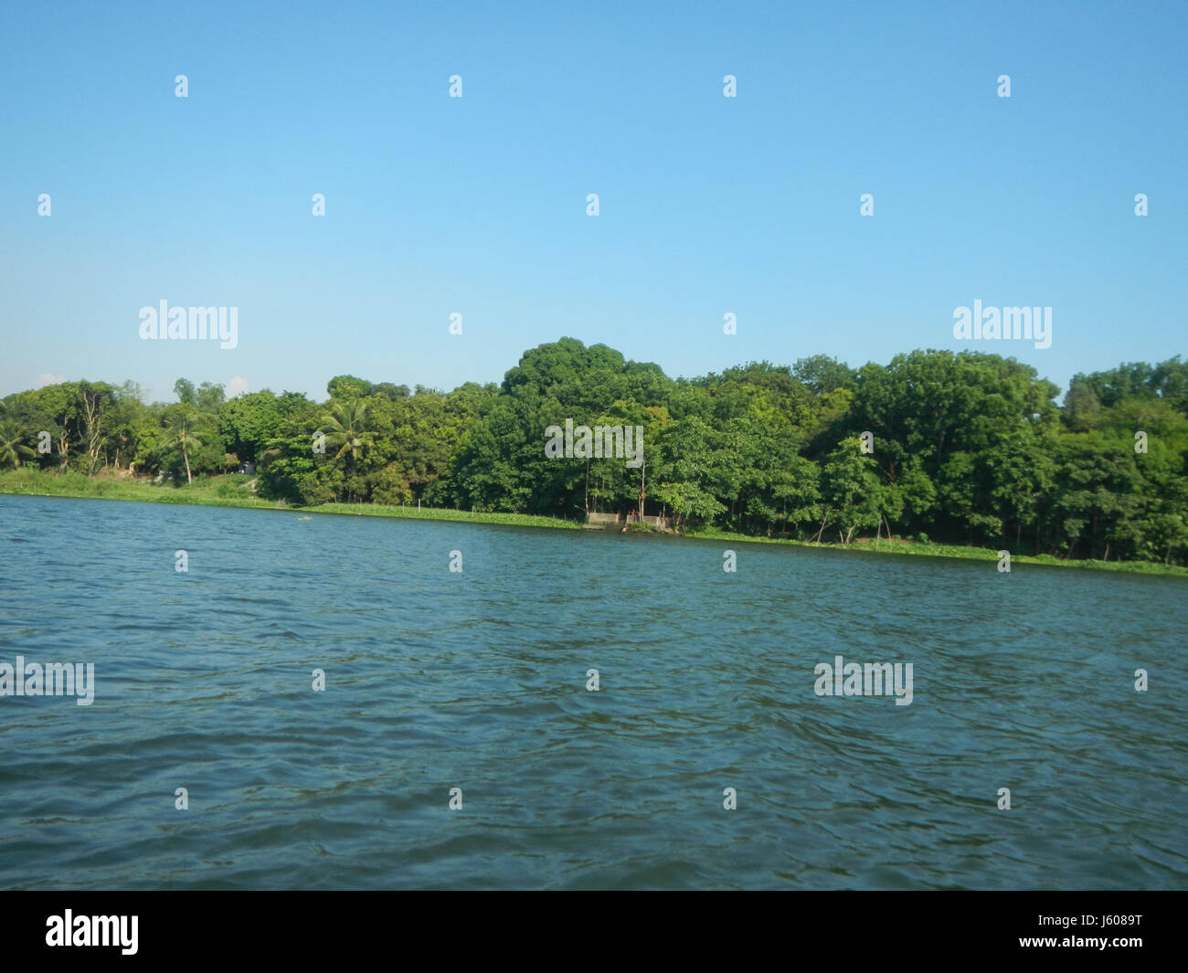 The image shows the riverbanks in Pulilan, Plaridel, Bulacan, with ...