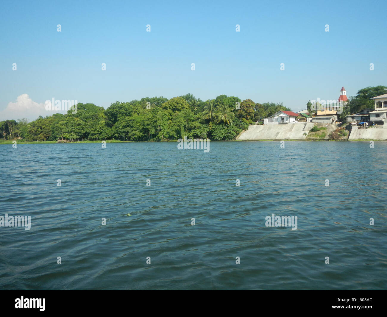 This image shows the riverbanks of Pulilan, Plaridel in Bulacan ...