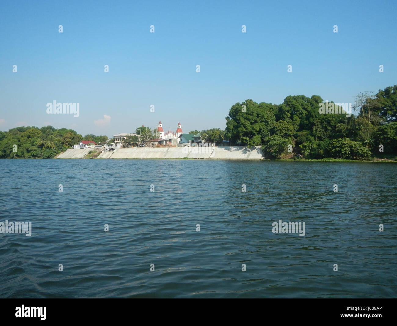 This image depicts the riverbanks and riprap constructions along the ...