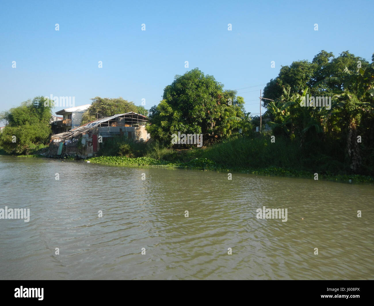 This image captures the riverside districts in Calumpit, Bulacan, and ...