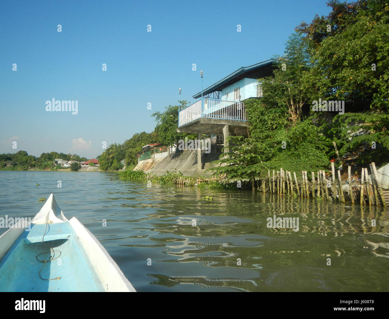 This image depicts the riverbank riprap construction along the Pulilan ...