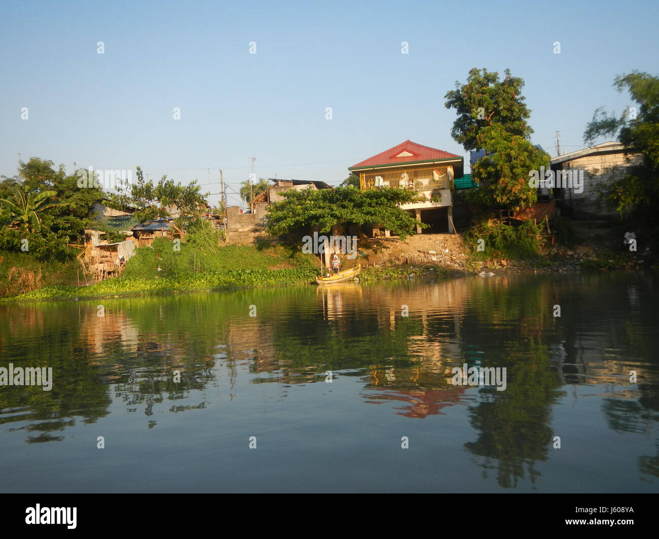 This image depicts the riverside districts of Calumpit in Bulacan and ...