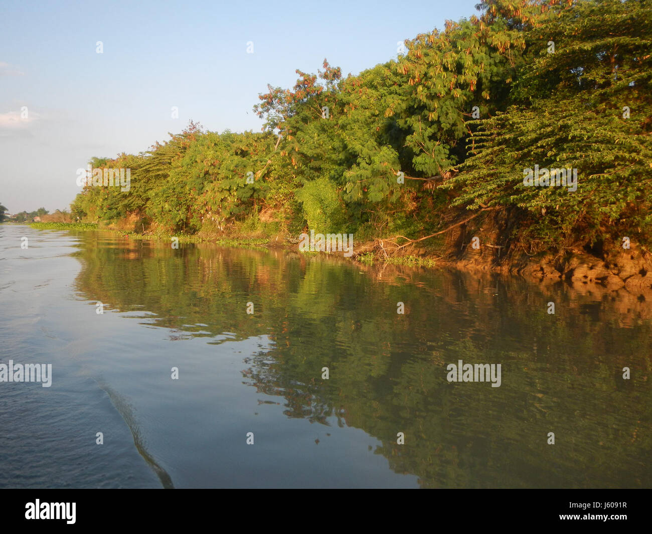 This image portrays the riverside areas and villages along the Pampanga ...