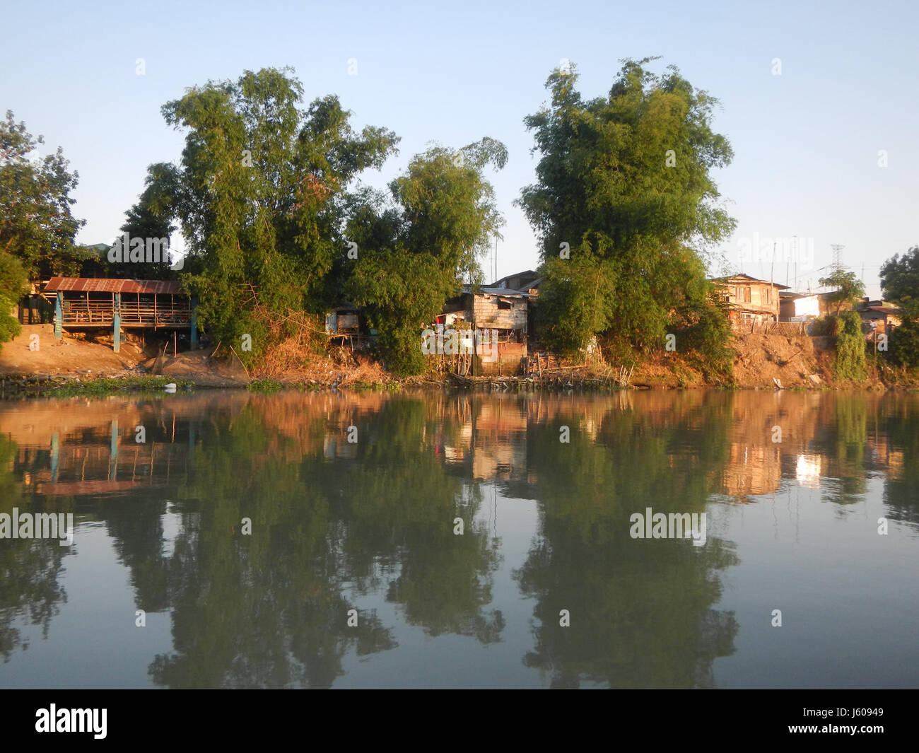 This entry describes the riverside districts and villages of Calumpit ...