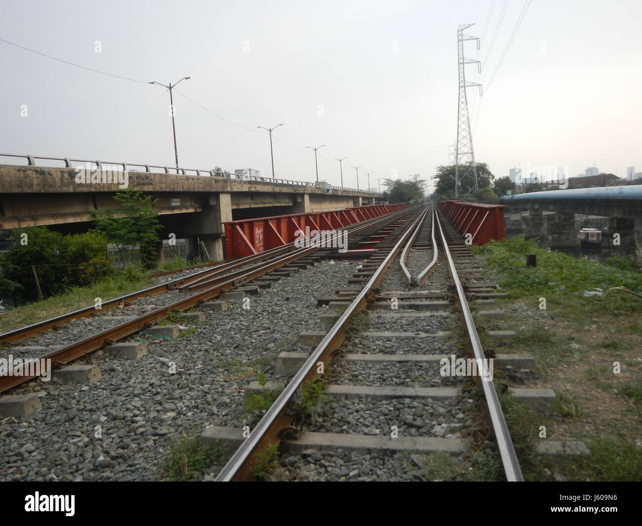 This title references the Santa Mesa PNR Station in Manila, focusing on ...