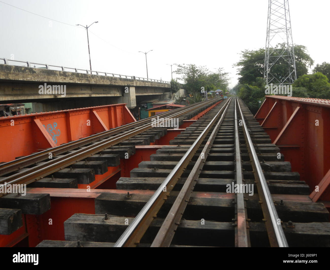 This scene shows the Santa Mesa PNR Station and Pandacan Railway tracks ...