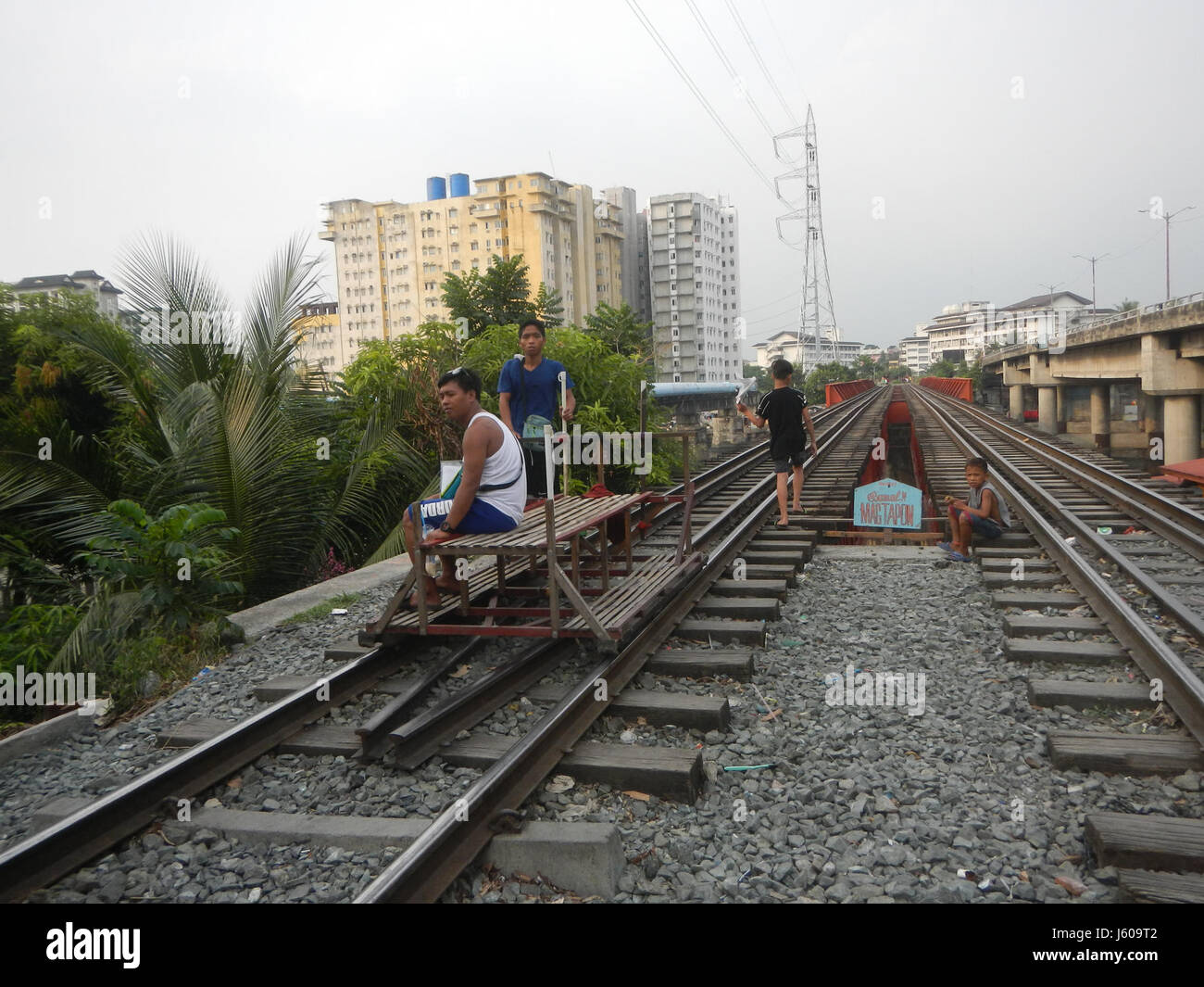 This image depicts the Santa Mesa PNR Station and surrounding railway ...