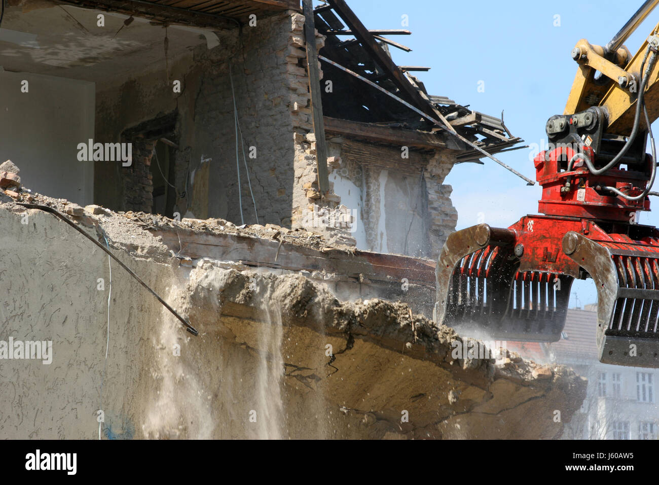 house building dredger demolition scrapping rubble bricks buildings ...