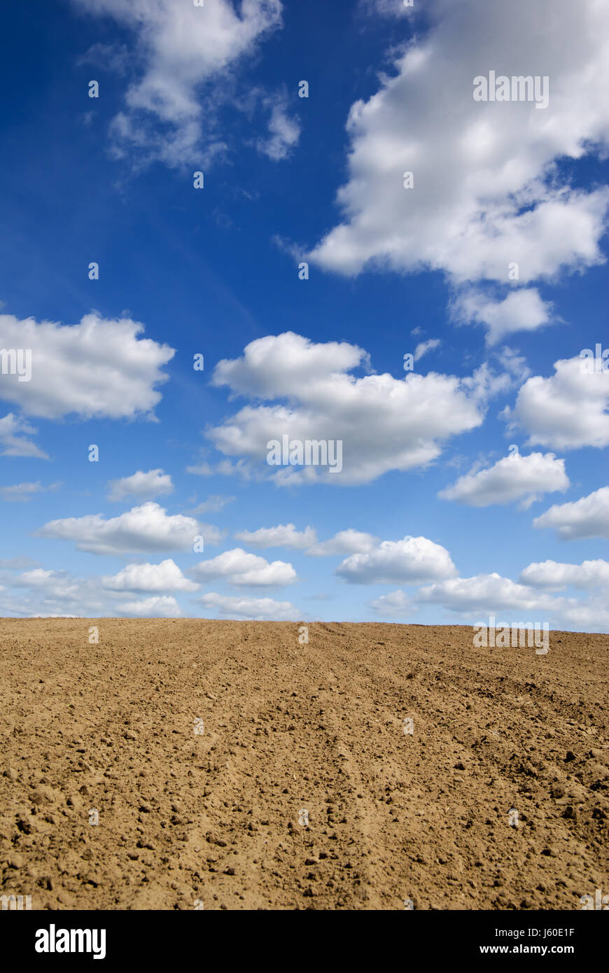 blue ground soil earth humus field ploughed clouds firmament sky blue ...