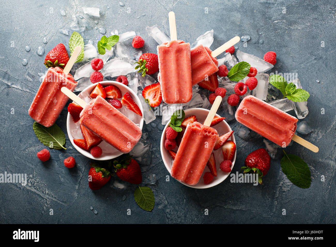 Strawberry and raspberry popsicles Stock Photo - Alamy