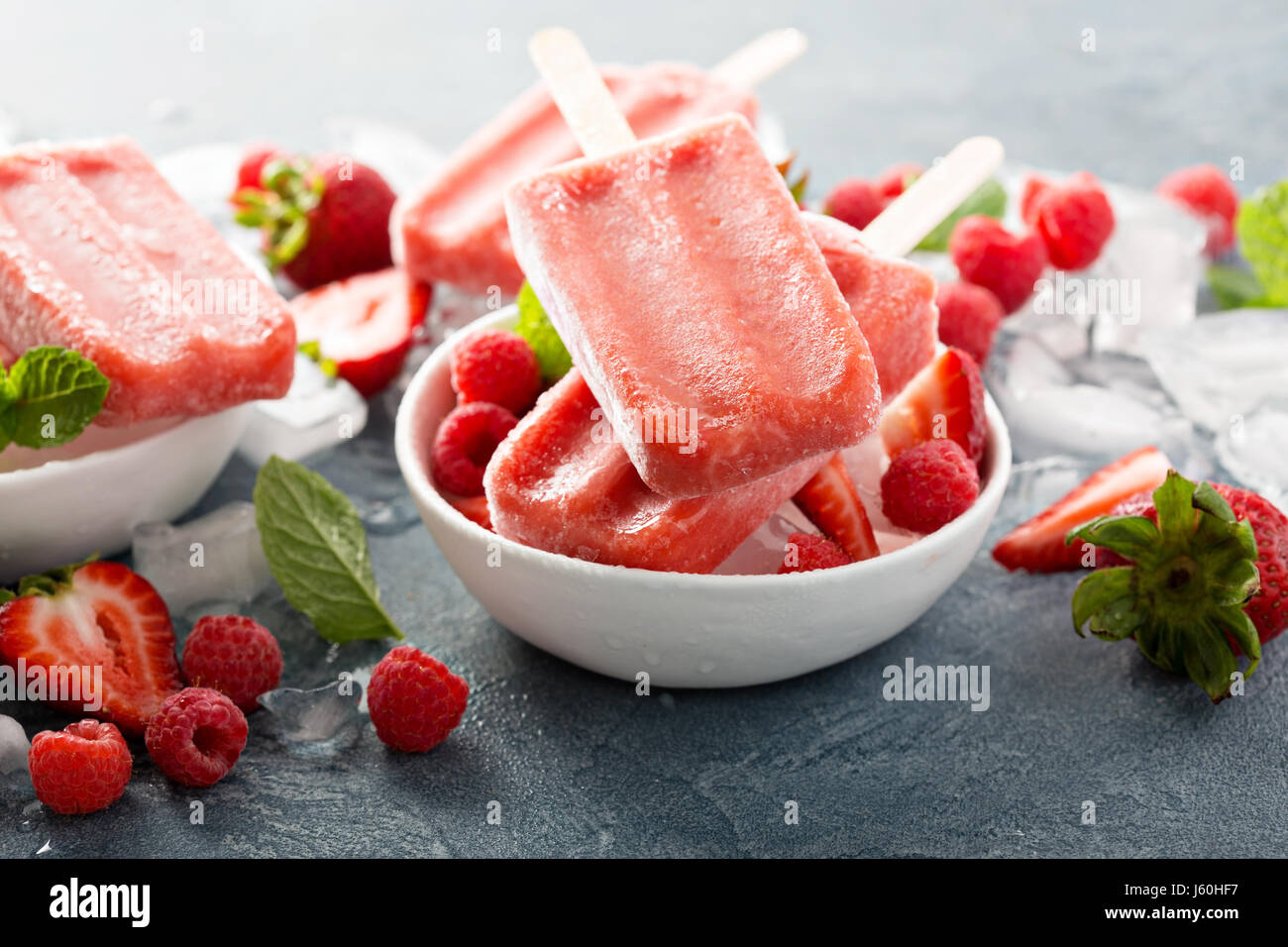 Strawberry and raspberry popsicles Stock Photo - Alamy