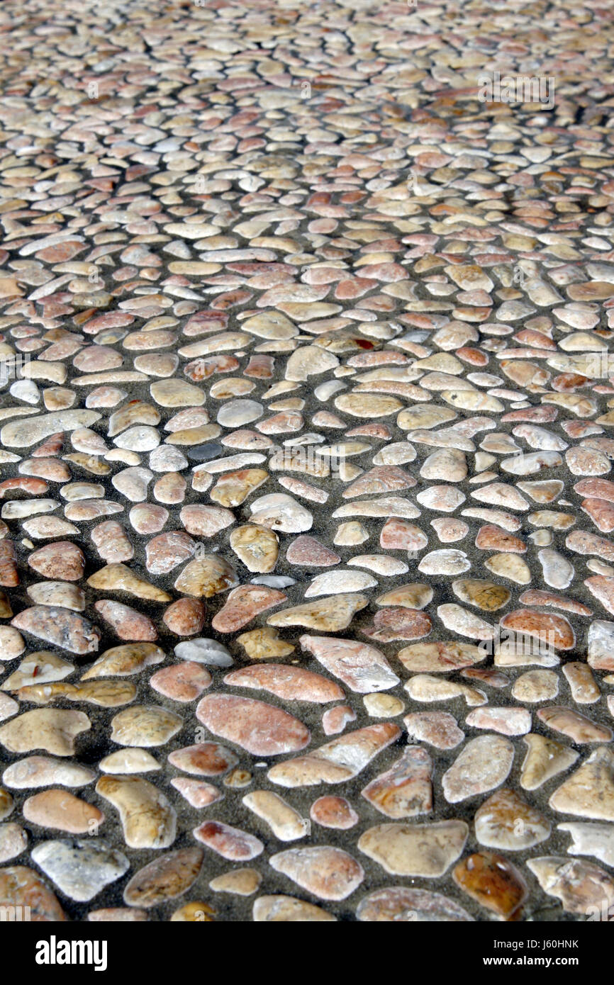 stone small tiny little short backdrop background many stones close ...