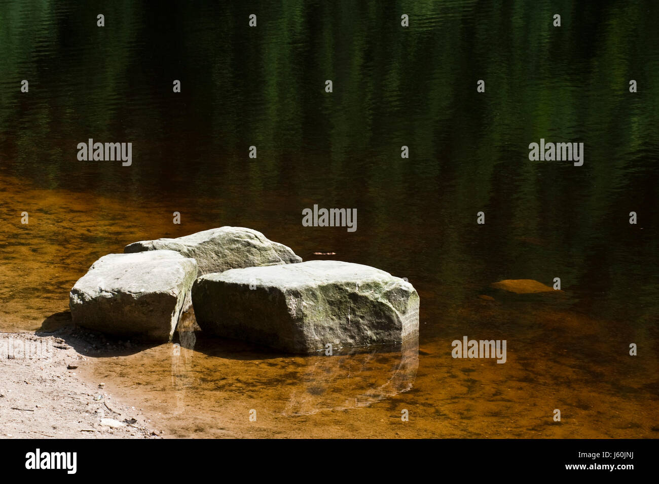stones in water Stock Photo - Alamy