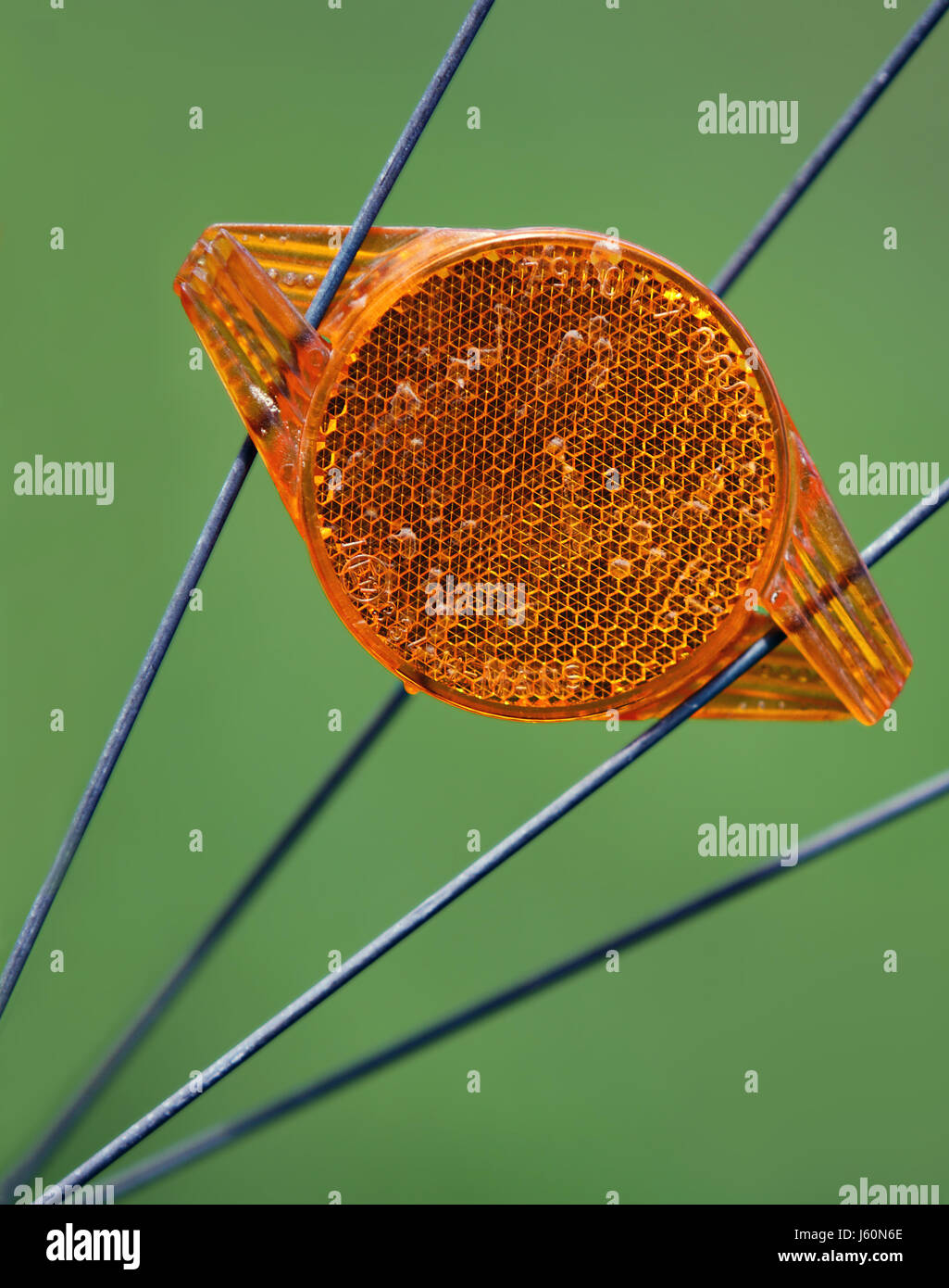 wheel reflector spoke spokes wheel green sunlight wheels location shot ...