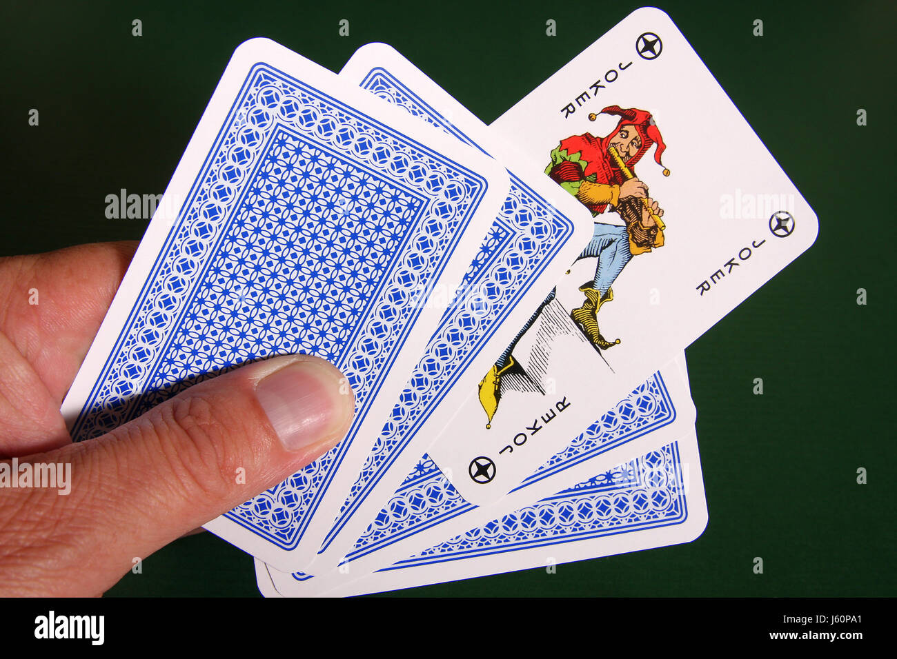 Joker hand finger hi-res stock photography and images - Alamy