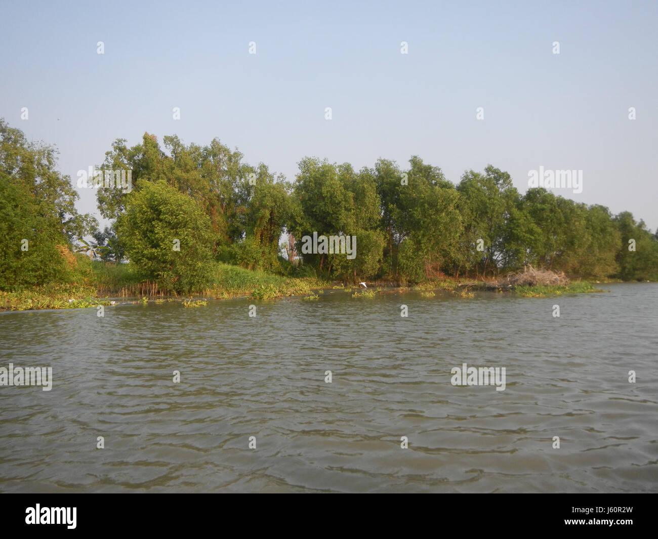 This image showcases the riverbanks and villages along the Pampanga ...