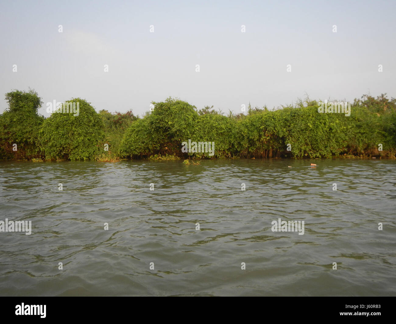 This image shows the riverbanks and villages in the Masantol district ...