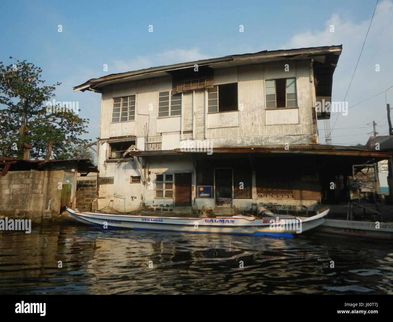A view of the riverbanks in the Malolos River District, focusing on ...