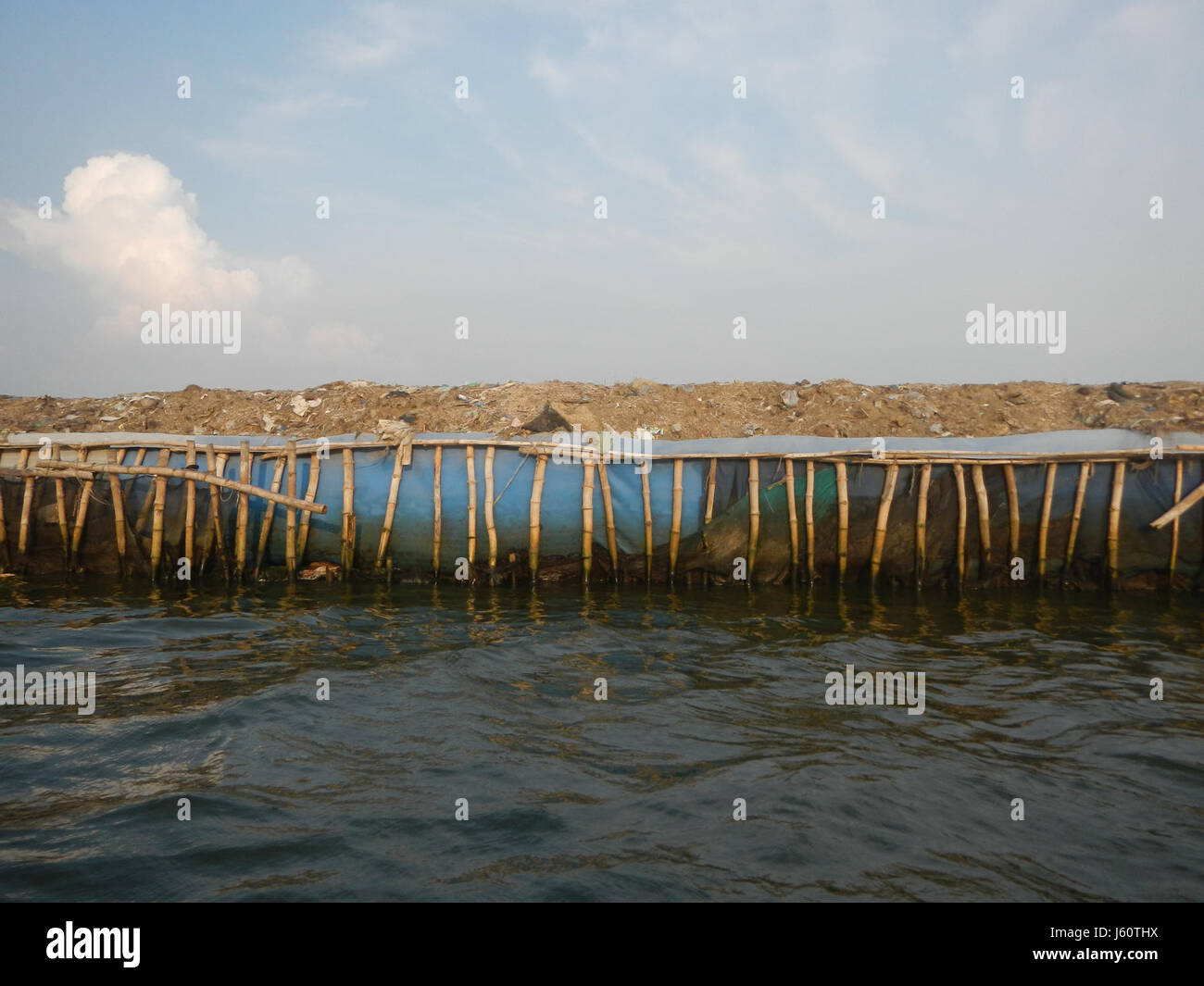 This image likely depicts riverbanks along Panasahan in Malolos, San ...