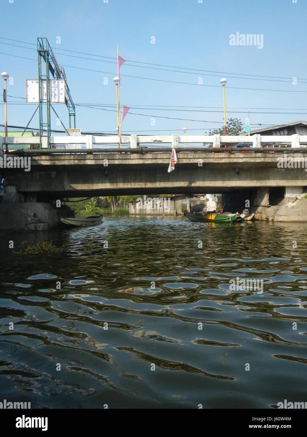 The Malolos River in the Philippines flows through various districts ...
