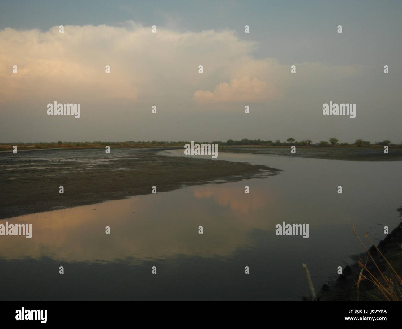 This photograph features a beautiful sunset in San Jose, Paombong ...