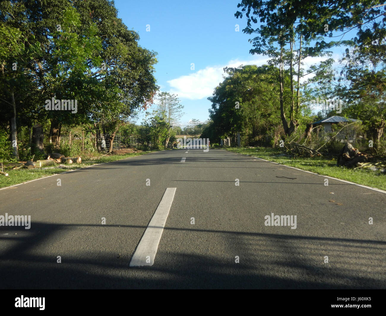 A view of San Miguel Sibul Road in Bulacan, Philippines, this image ...