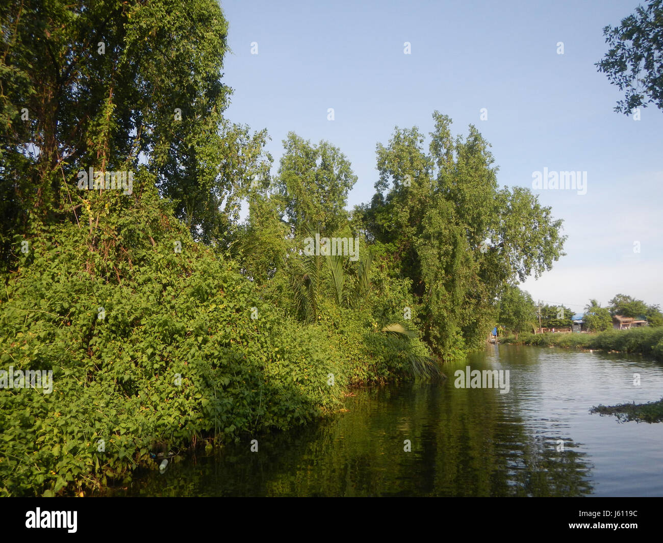 This scene captures the Malolos River districts in Bulacan, Philippines ...