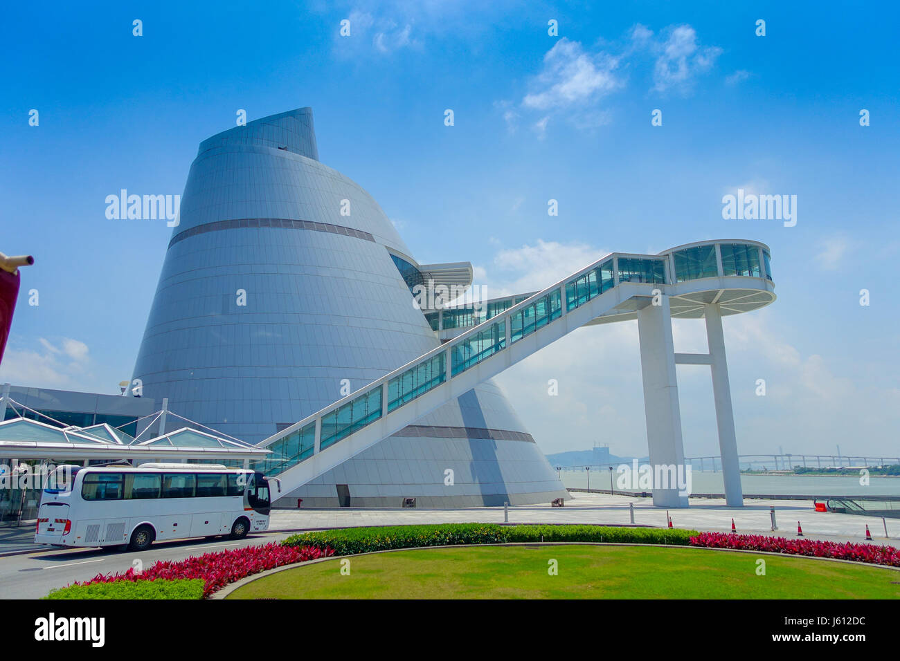 Macau Science Center, a distinctive, asymmetrical, conical shape ...