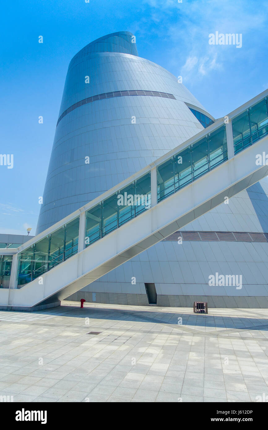 Macau Science Center, a distinctive, asymmetrical, conical shape ...