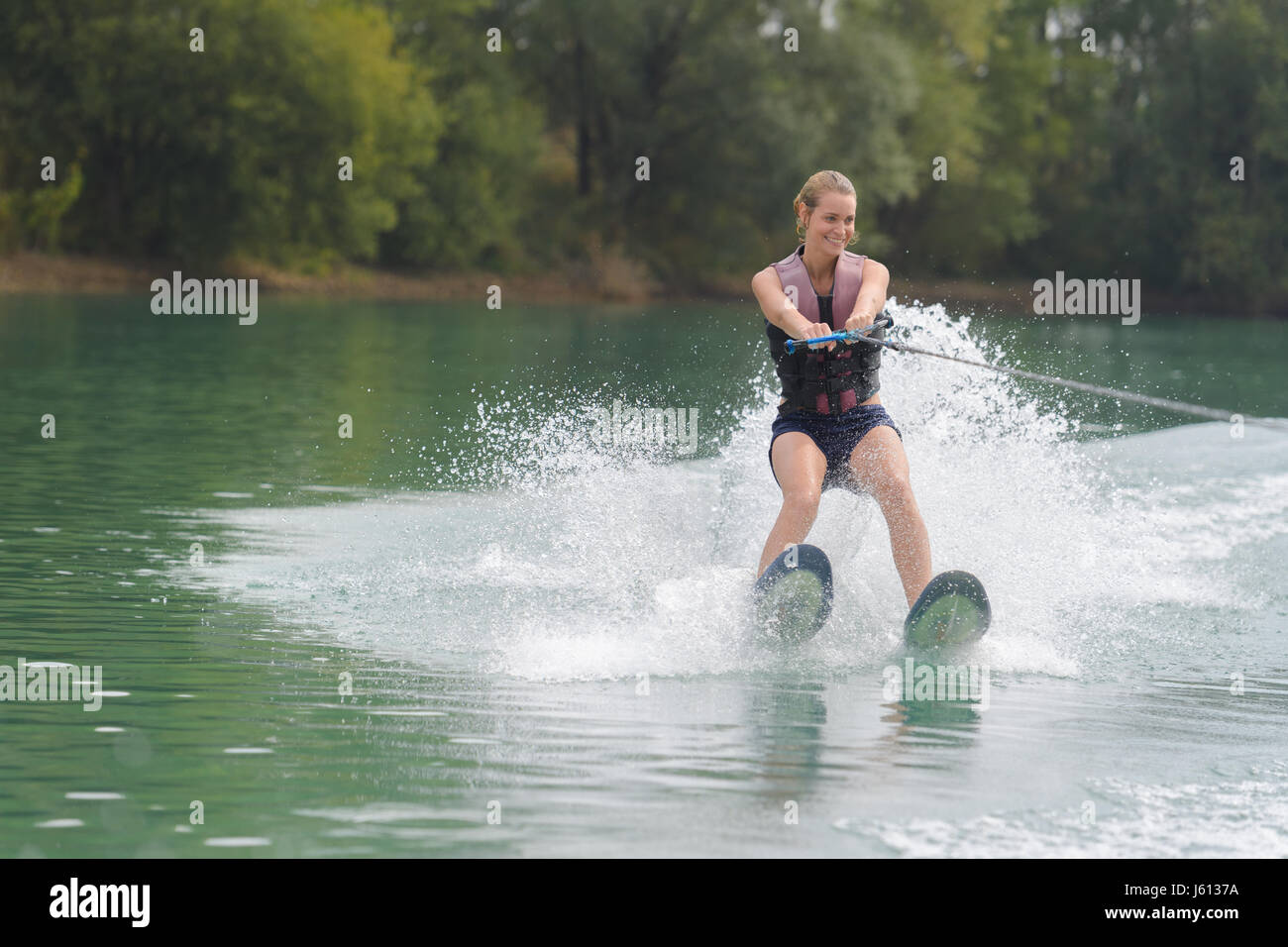 Woman waterskiing hi-res stock photography and images - Alamy