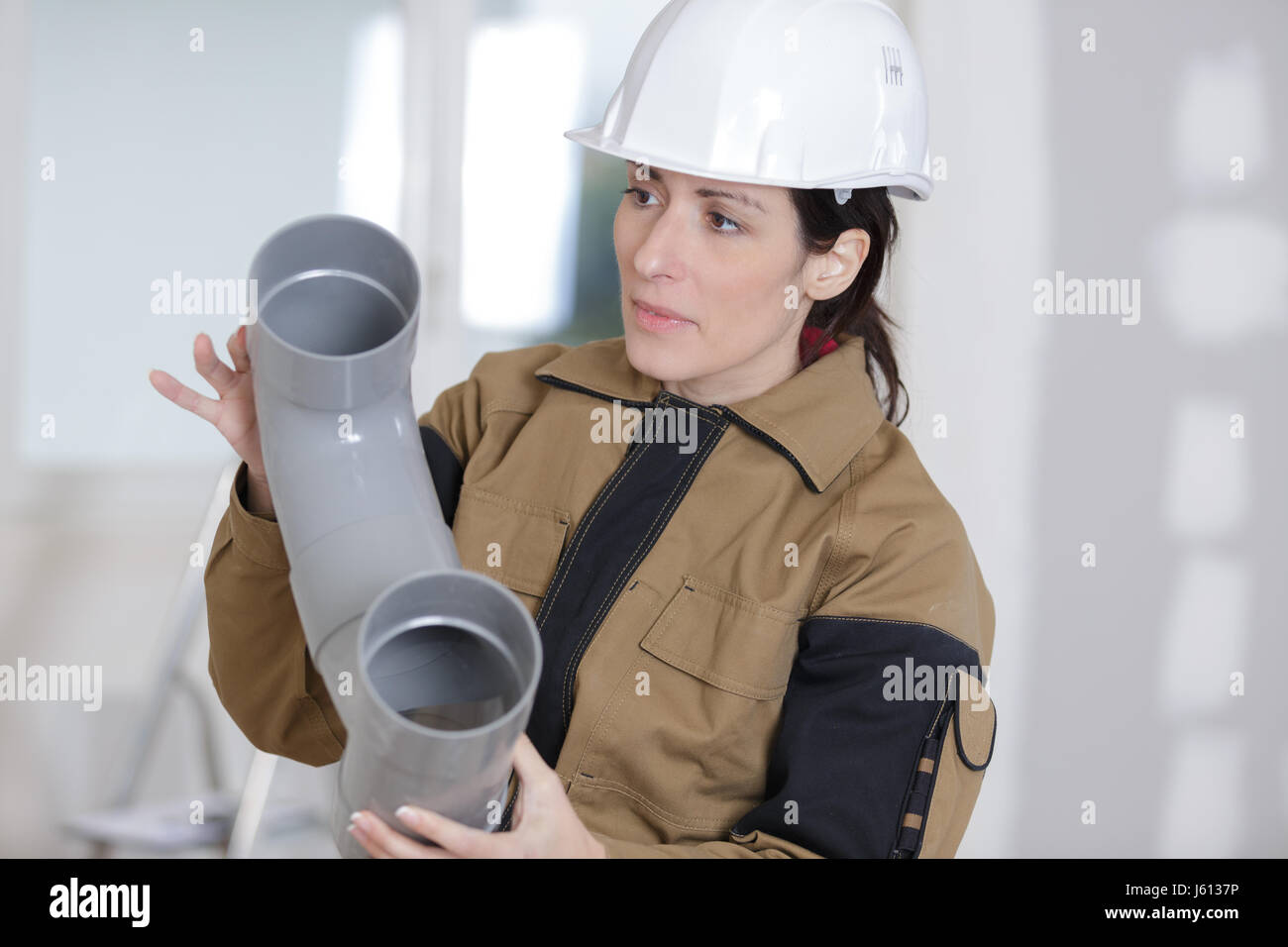 Woman female plumber drain hi-res stock photography and images - Alamy