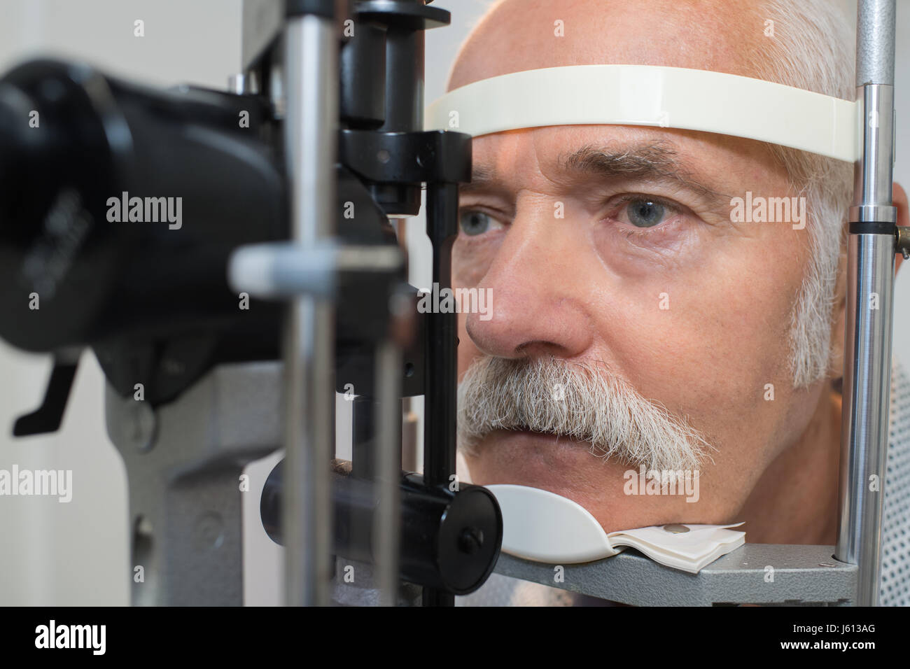Closeup of senior man having eye test Stock Photo - Alamy
