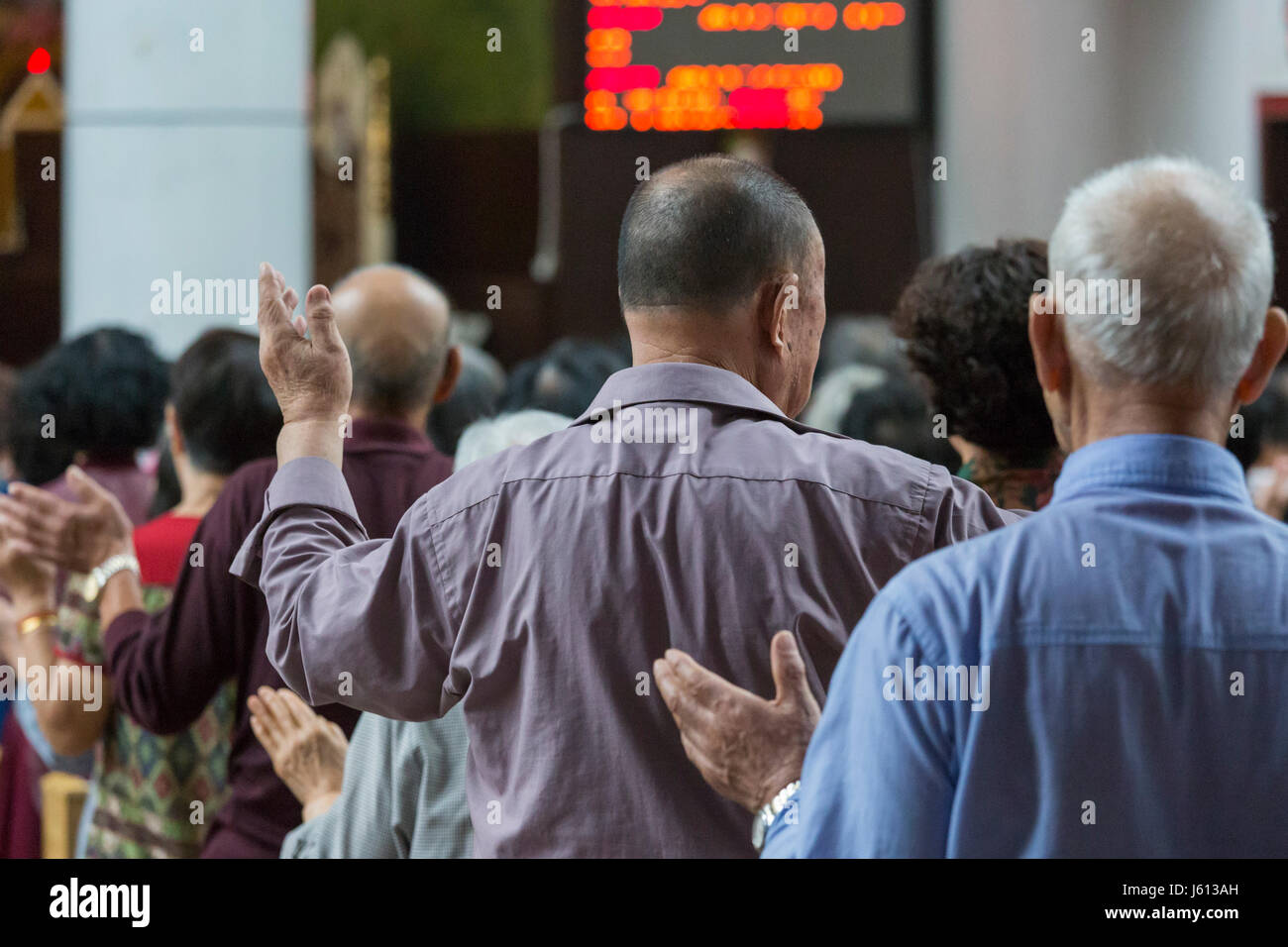 Catholic chinese praying church hi-res stock photography and images - Alamy