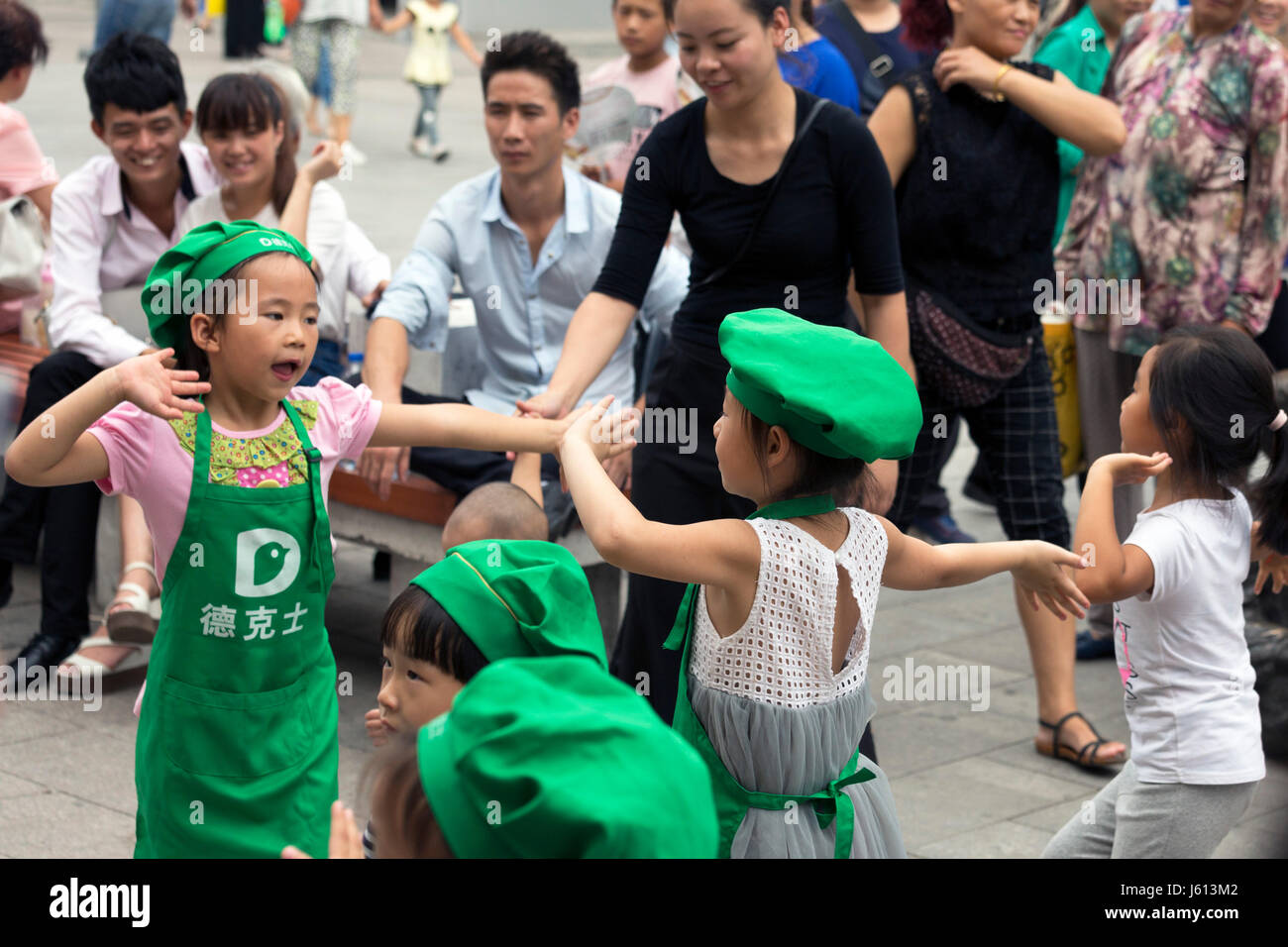 Chinese children learning to dance at fast food restaurant, Yinchuan ...
