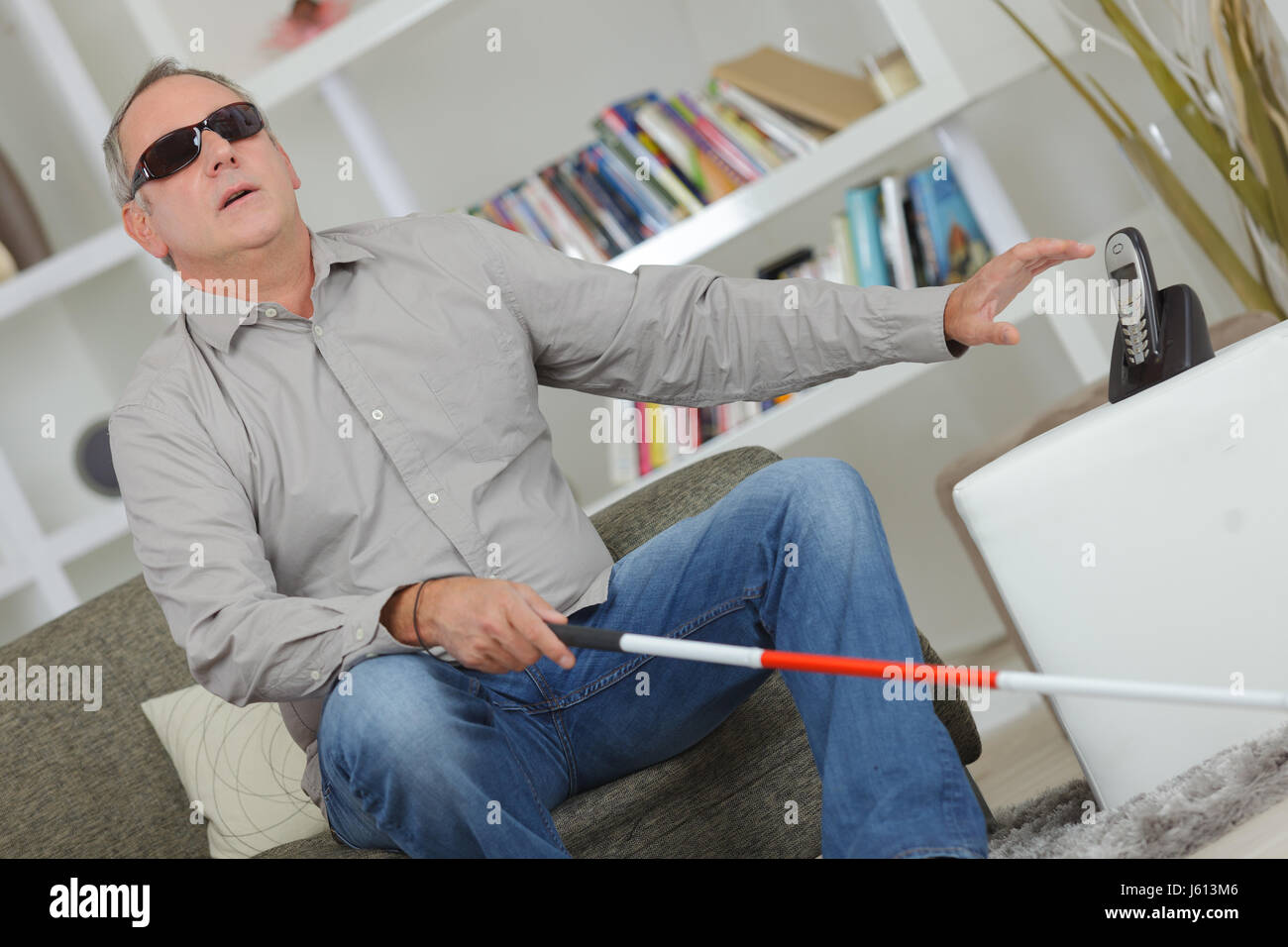 Blind deaf stick hi-res stock photography and images - Alamy