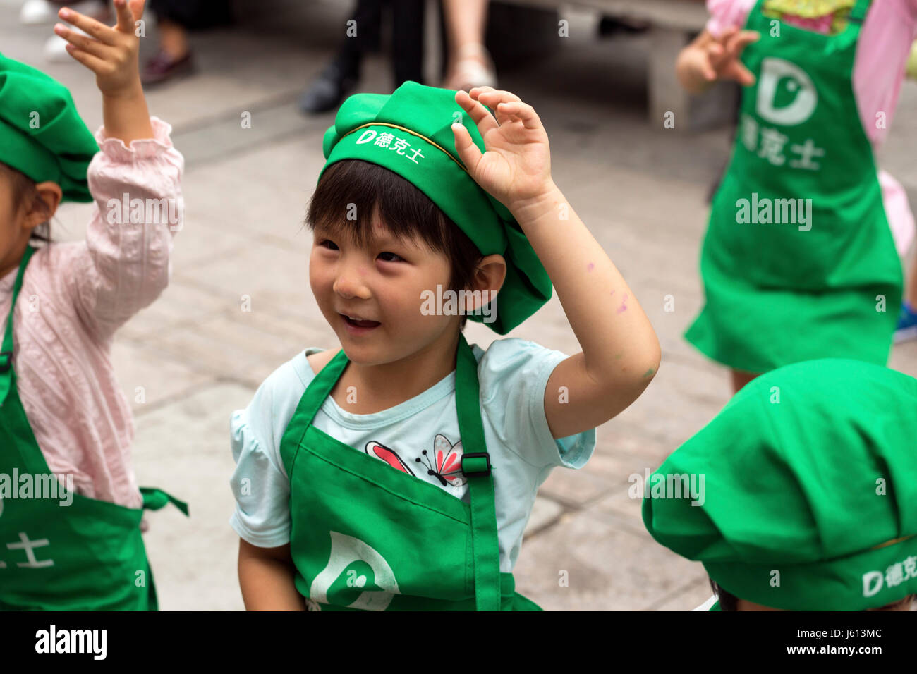 Chinese children learning to dance at fast food restaurant, Yinchuan ...