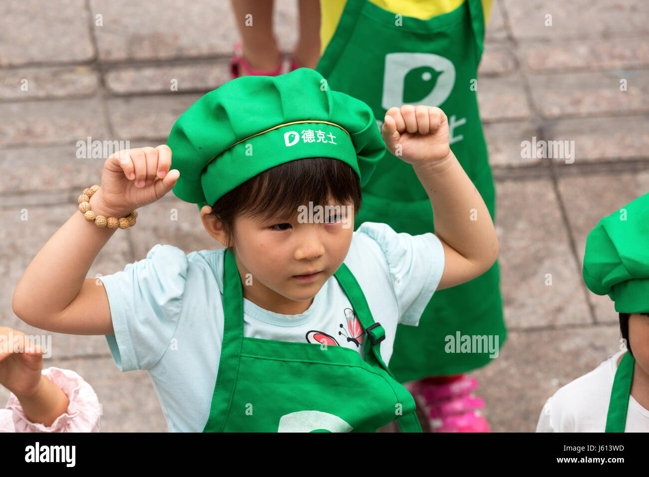 Chinese children learning to dance at fast food restaurant, Yinchuan ...