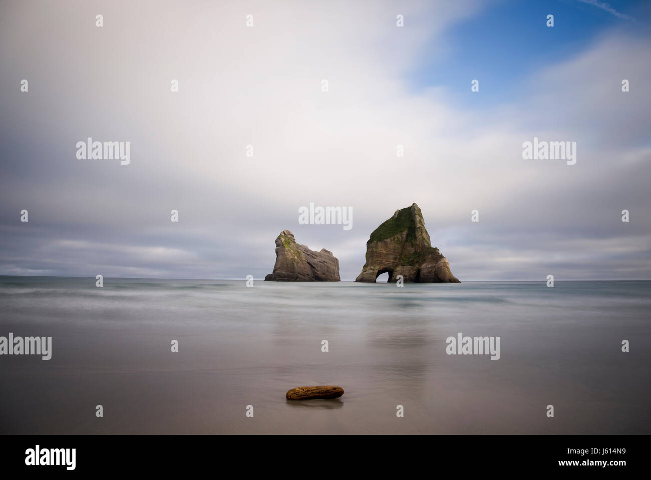 Farewell Spit New Zealand beach Rock haystacks Stock Photo - Alamy