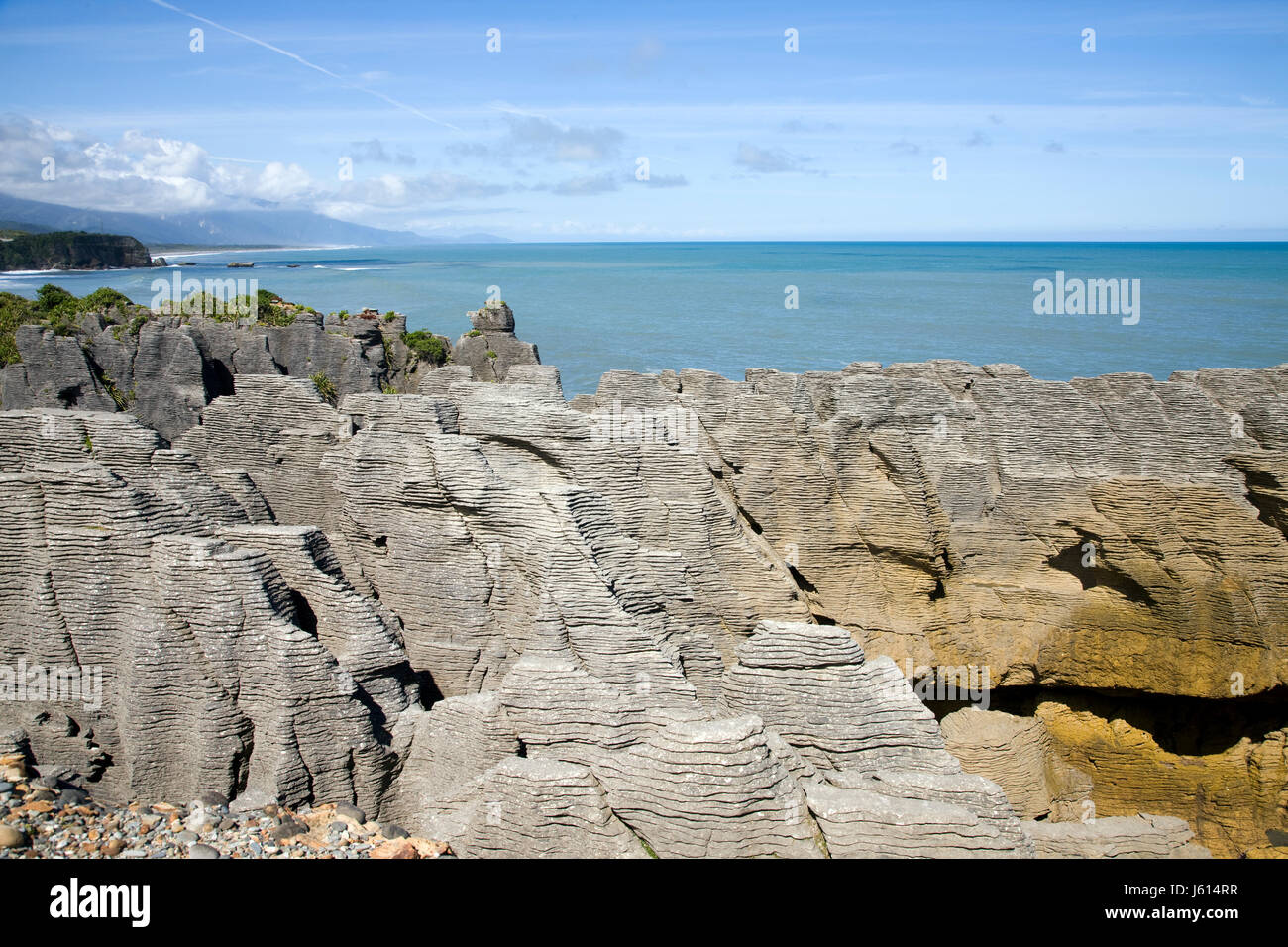 Pancake Rocks New Zealand summer blue sky Stock Photo - Alamy